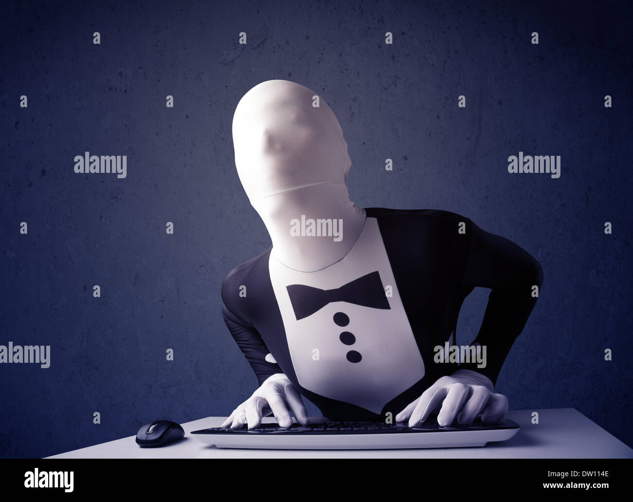 Man without identity working with keyboard on blue background Stock ...