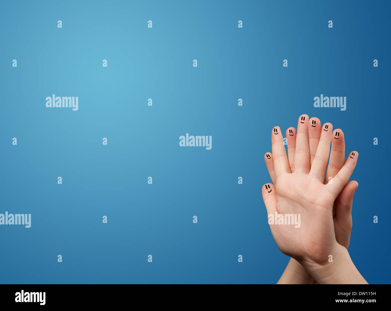 Happy smiley face fingers looking at empty blue background copy space ...