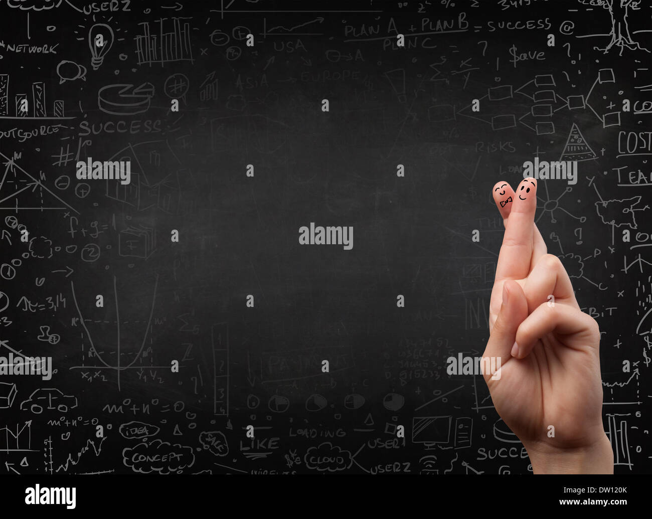 Happy finger smileys with black chalkboard in background Stock Photo ...