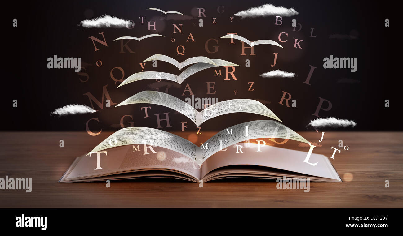 Pages and glowing letters flying out of a book Stock Photo - Alamy