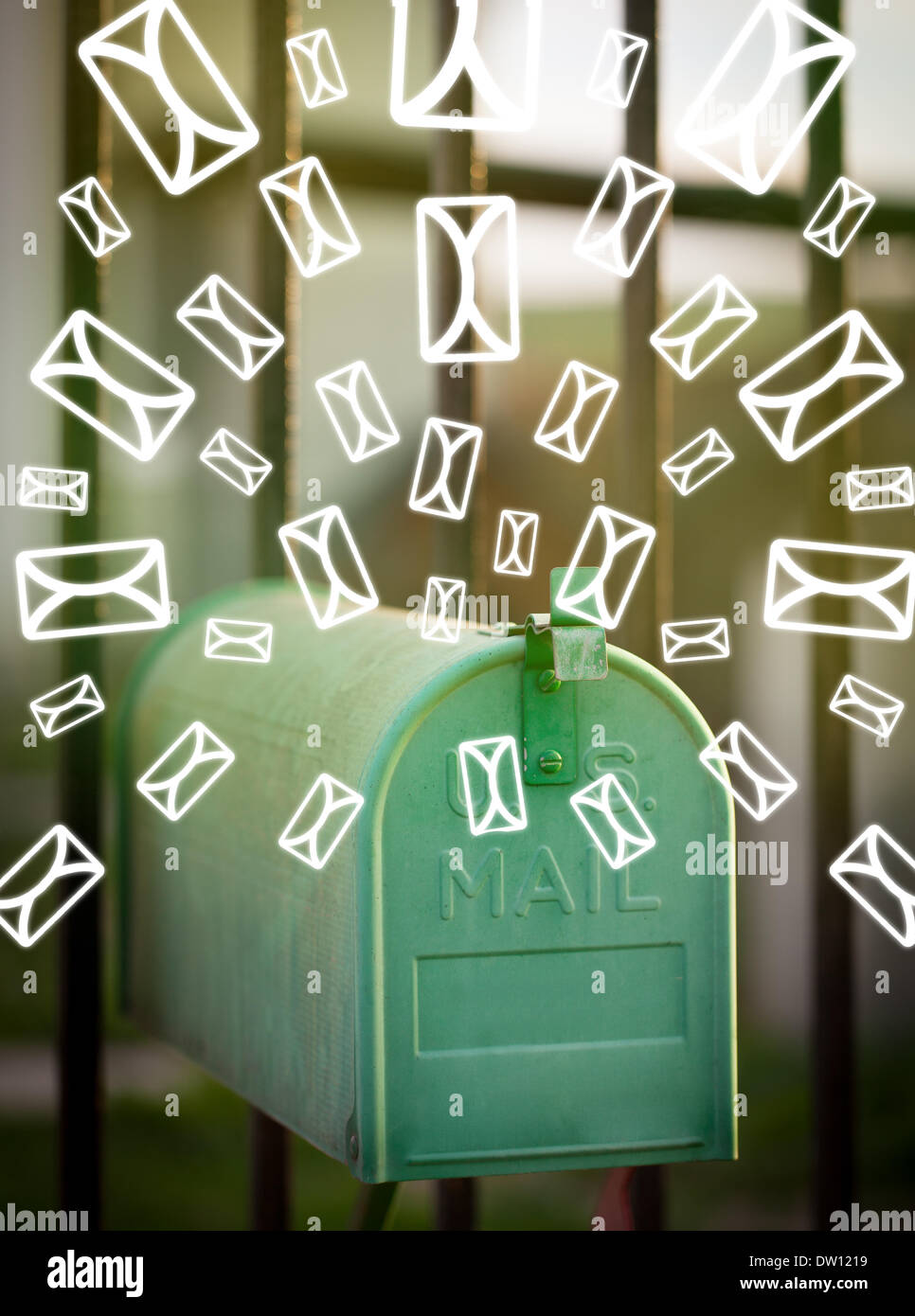 Mailbox with letter icons on glowing green background Stock Photo - Alamy