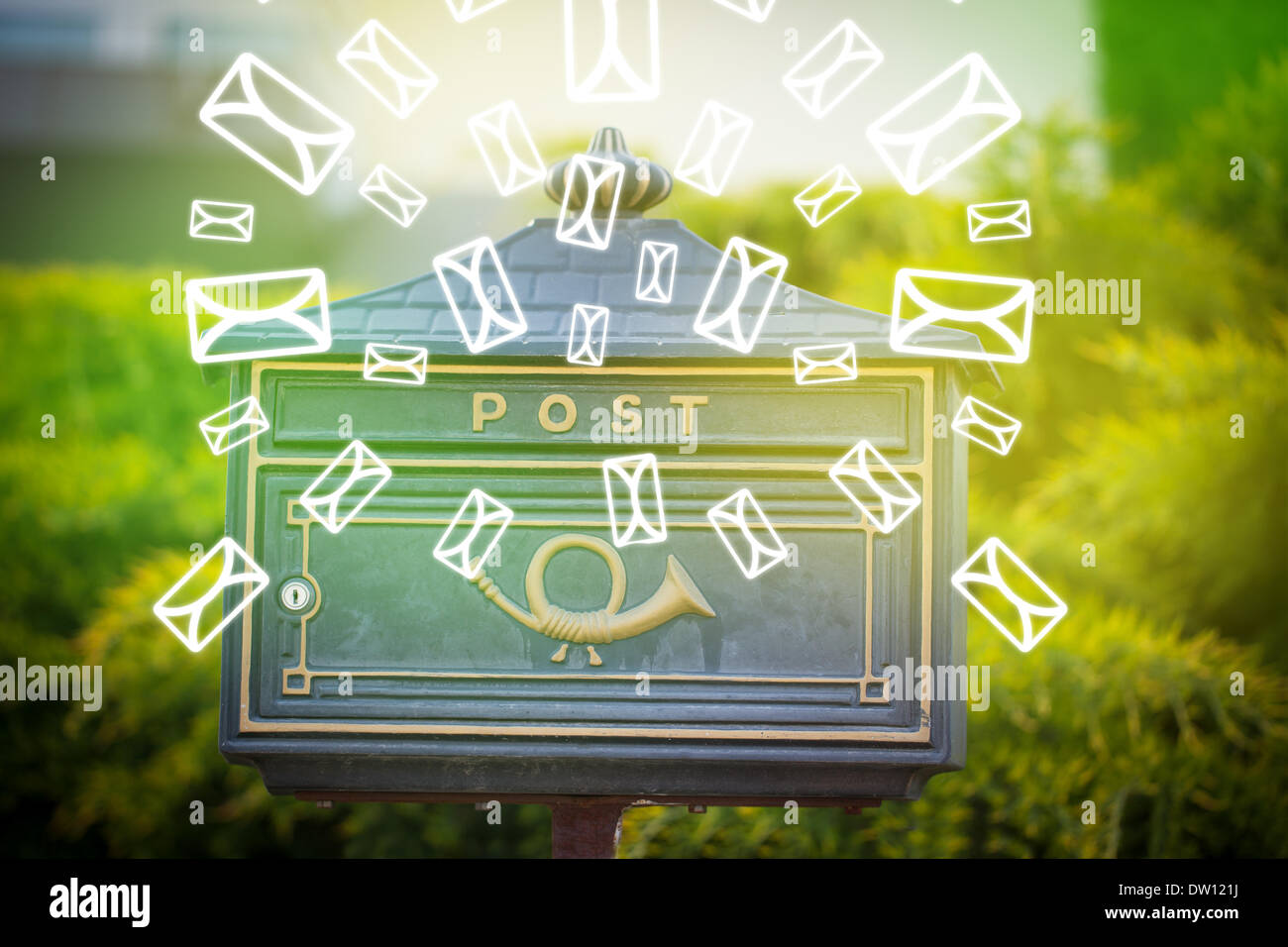 Mailbox with letter icons on glowing green background Stock Photo - Alamy