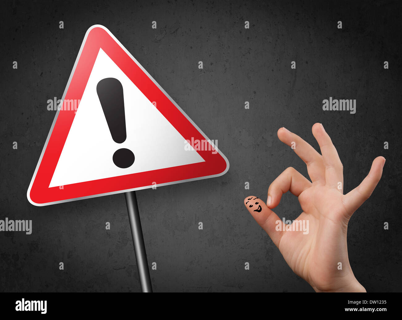 Happy smiley fingers looking at triangle warning sign with exclamation ...