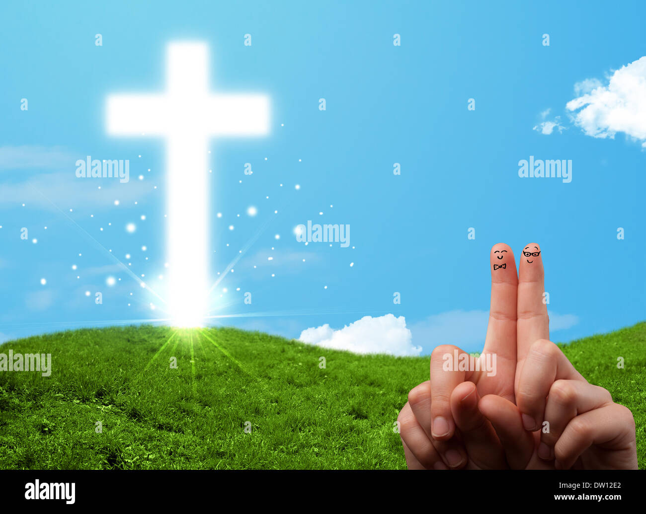 Happy finger smileys with christian religion cross Stock Photo - Alamy