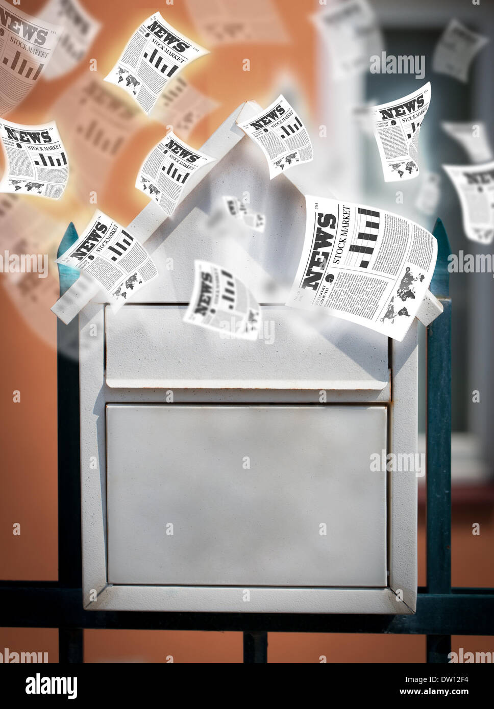 Post box with daily newspapers flying Stock Photo - Alamy