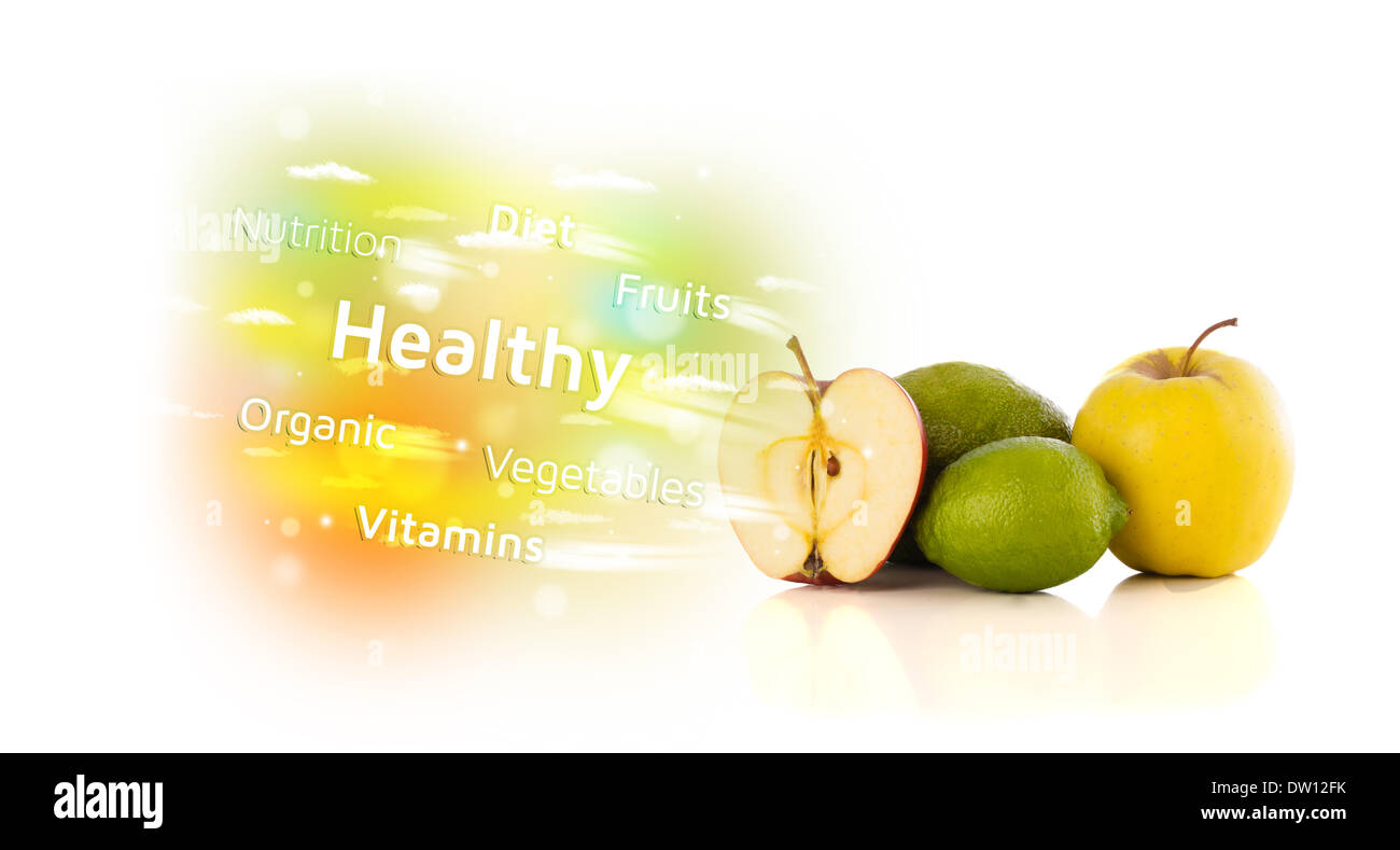 Colorful juicy fruits with healthy text and signs Stock Photo - Alamy