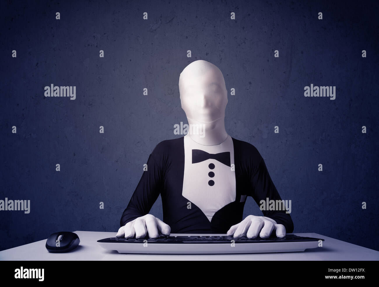 Man without identity working with keyboard on blue background Stock ...