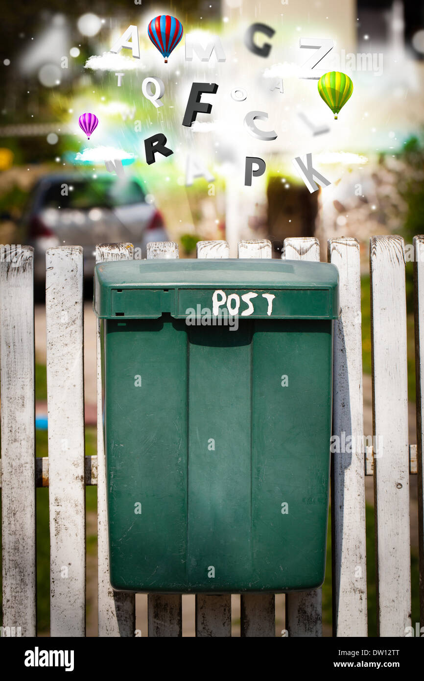 Post box with colorful letters Stock Photo - Alamy