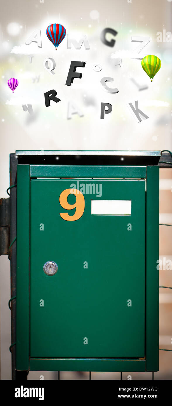 Post box with colorful letters Stock Photo - Alamy