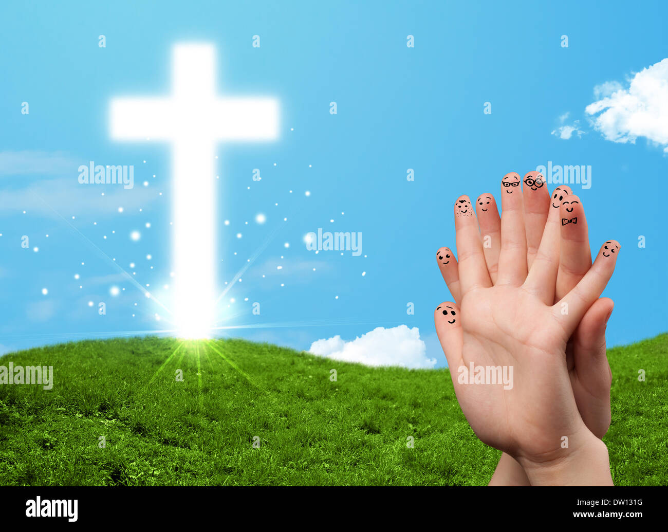 Happy finger smileys with christian religion cross Stock Photo - Alamy