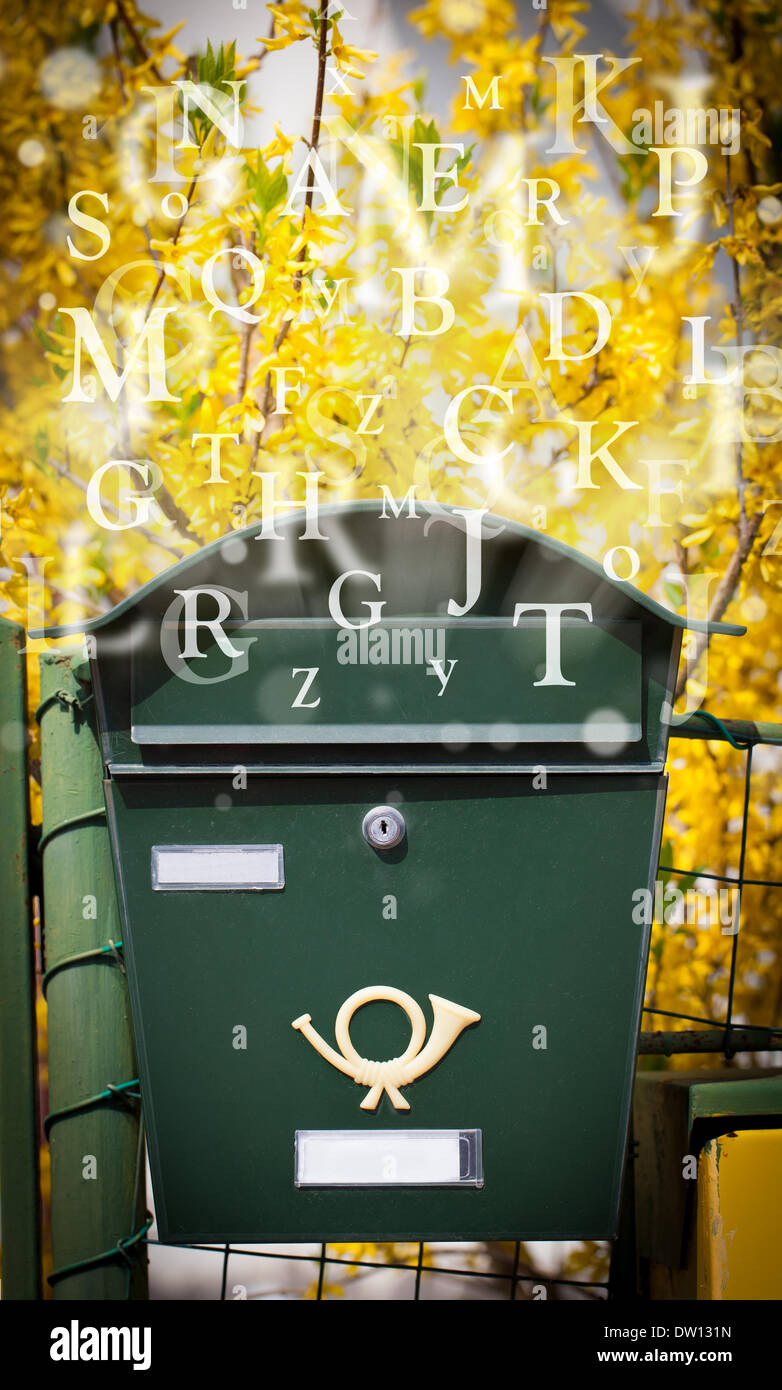 Mail box with letters comming out Stock Photo - Alamy