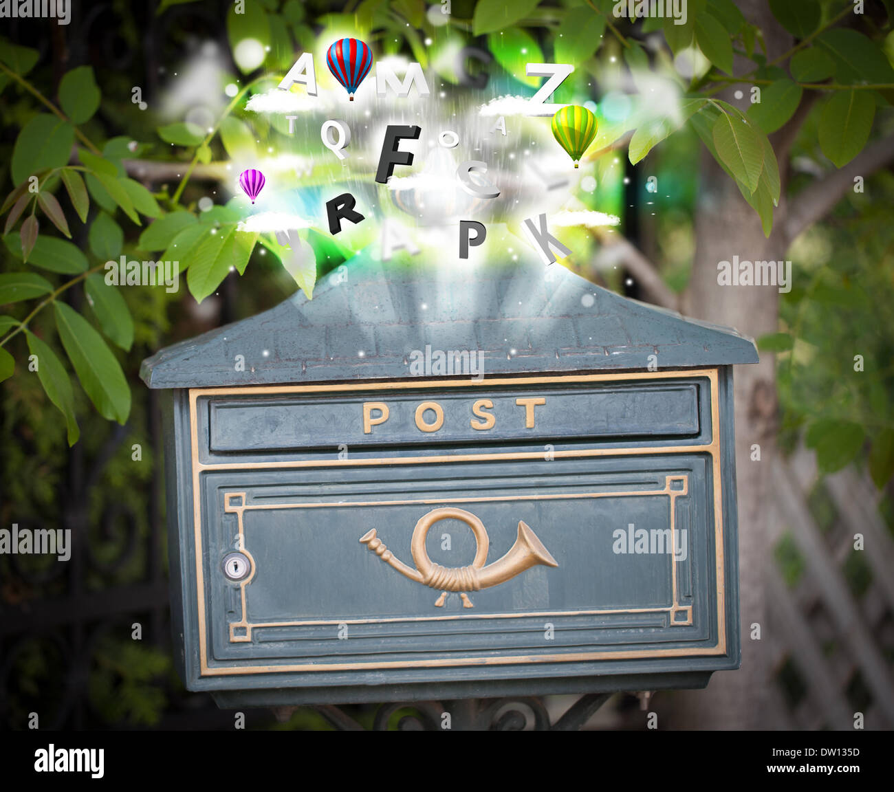 Post box with colorful letters Stock Photo - Alamy