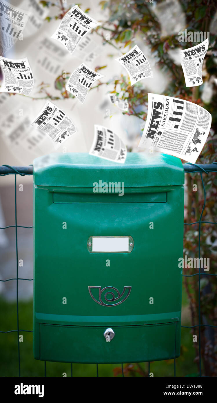Post box with daily newspapers flying Stock Photo - Alamy