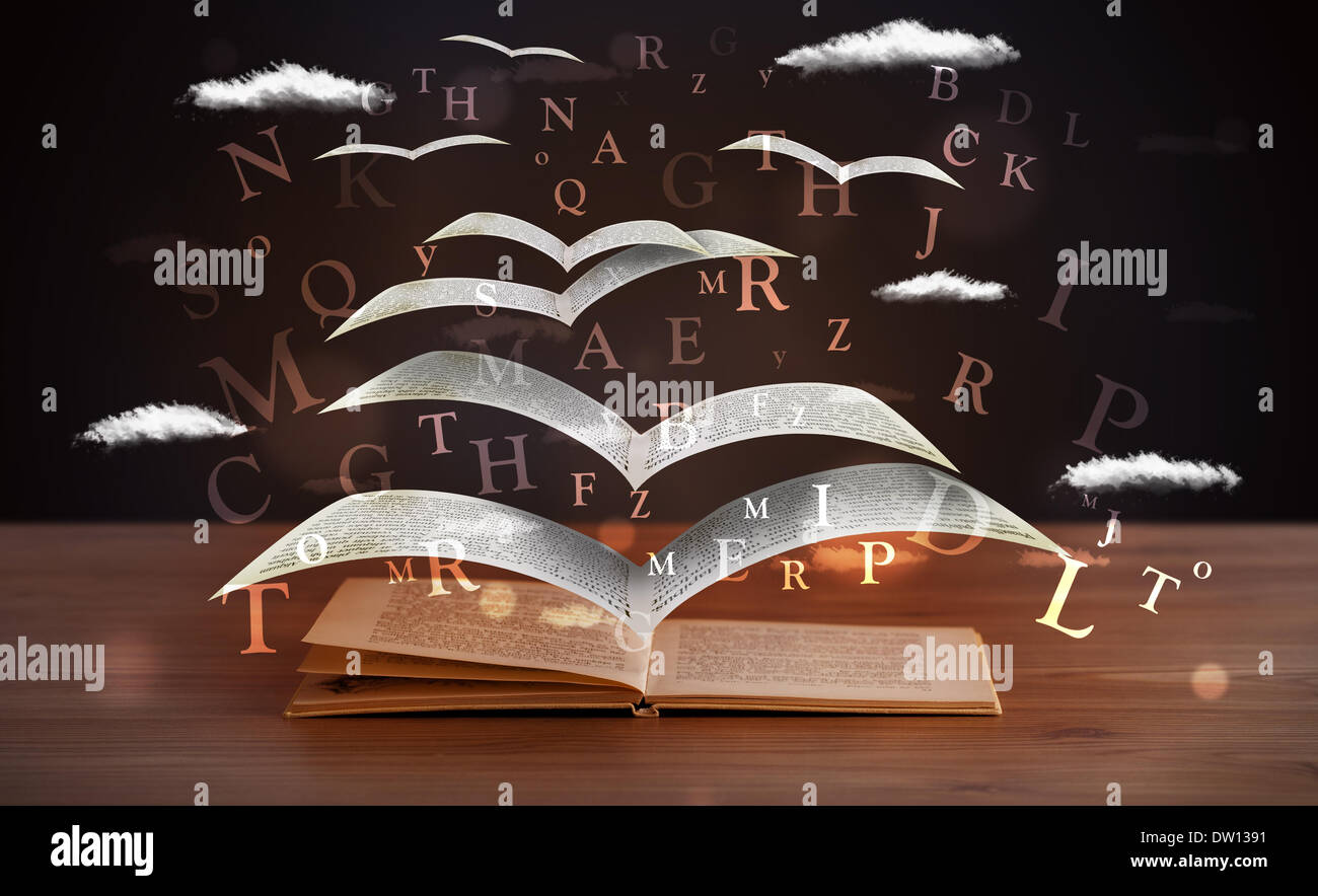 Pages and glowing letters flying out of a book Stock Photo - Alamy