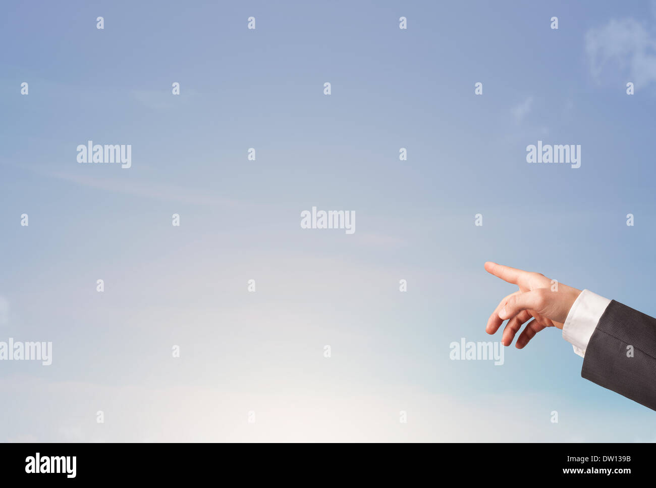 Hand aiming at at the blue sky copyspace Stock Photo - Alamy