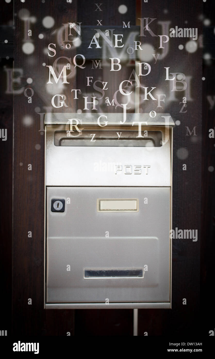 Mail box with letters comming out Stock Photo - Alamy