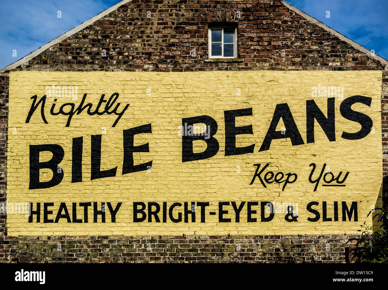 Bile Beans painted advert on side of building in York, UK Stock Photo ...