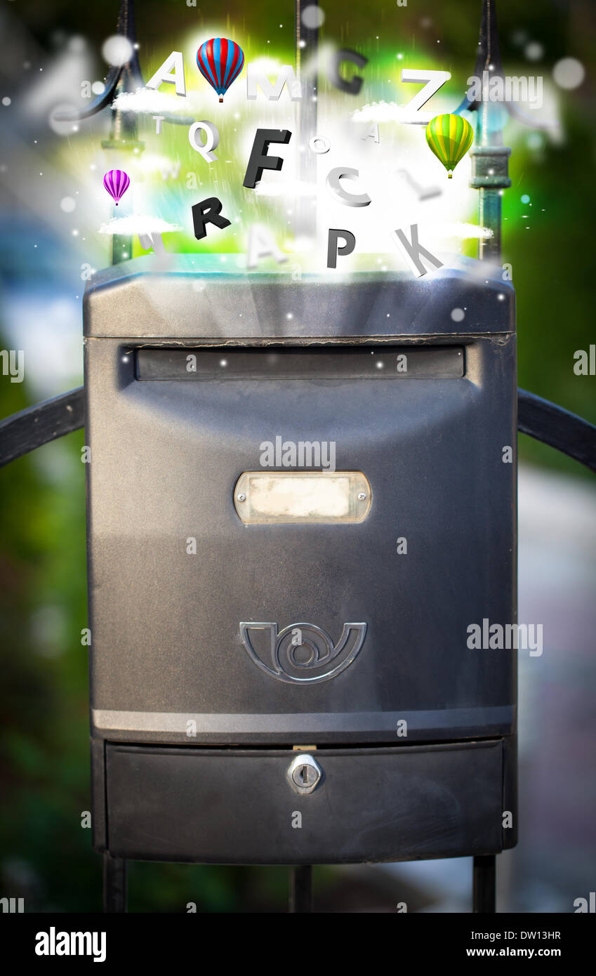 Post box with colorful letters Stock Photo - Alamy