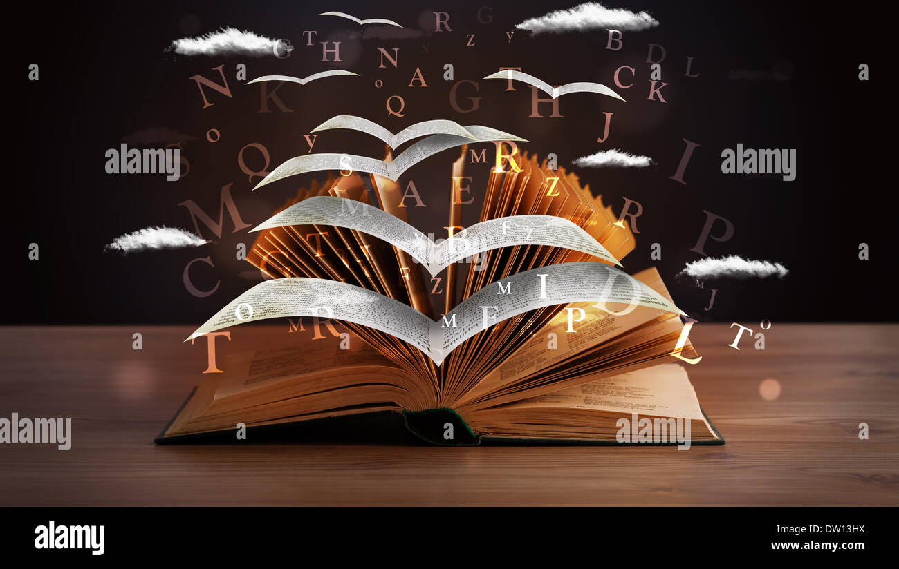 Open books glowing letters hi-res stock photography and images - Alamy