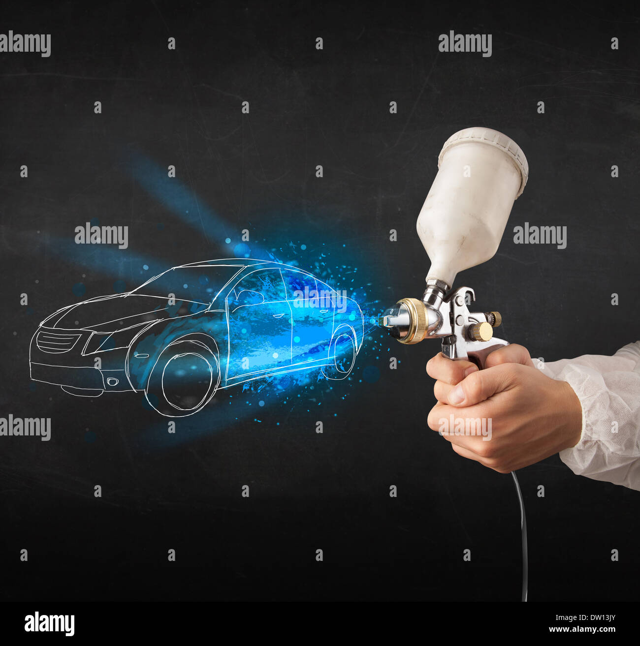 Worker with airbrush gun painting hand drawn car lines Stock Photo - Alamy