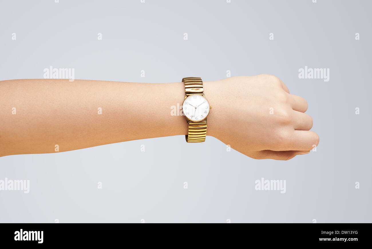 Hand with watch showing precise time Stock Photo - Alamy