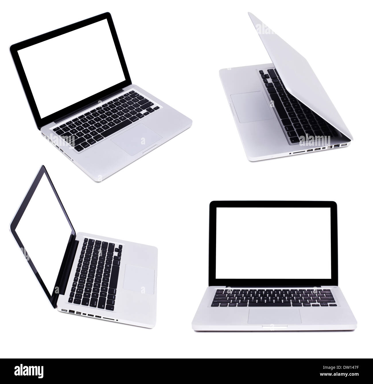 Collection of four silver laptops Stock Photo - Alamy