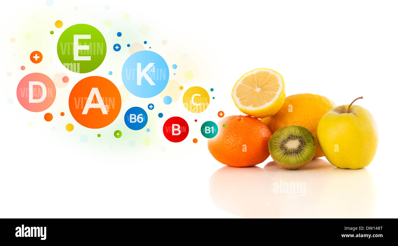 Healthy fruits with colorful vitamin symbols and icons Stock Photo - Alamy