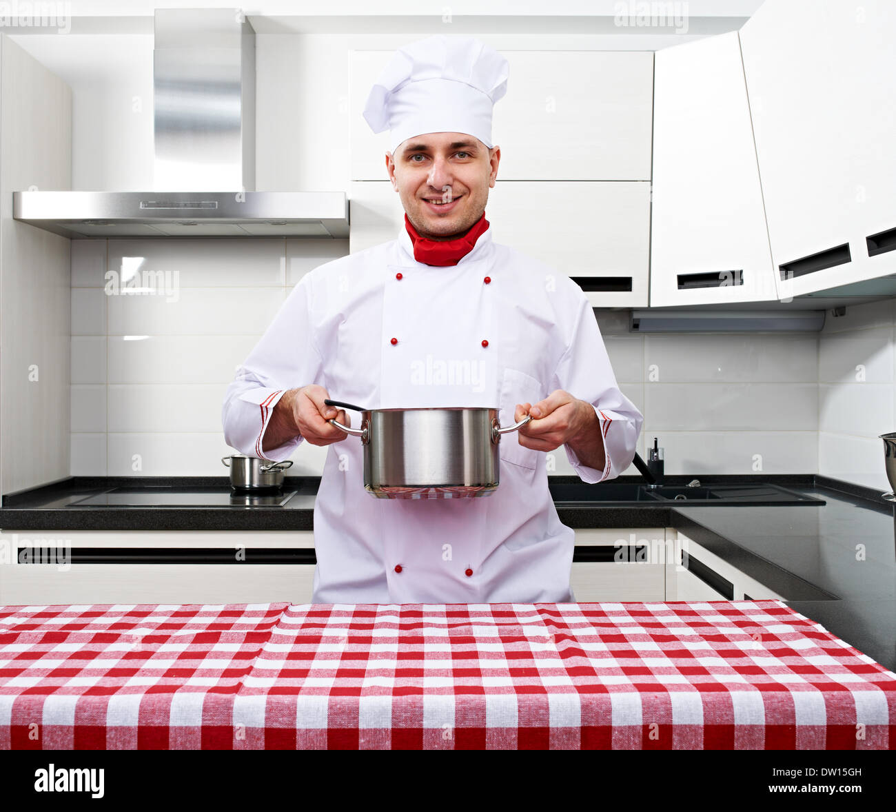 Male chef at kitchen Stock Photo - Alamy