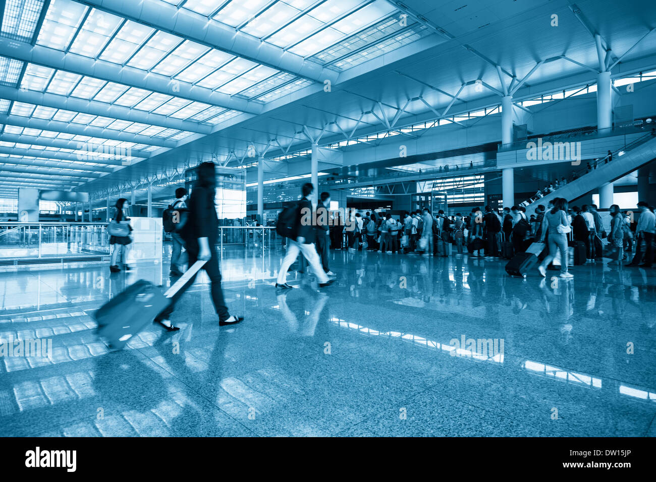 passenger in busy waiting room Stock Photo - Alamy