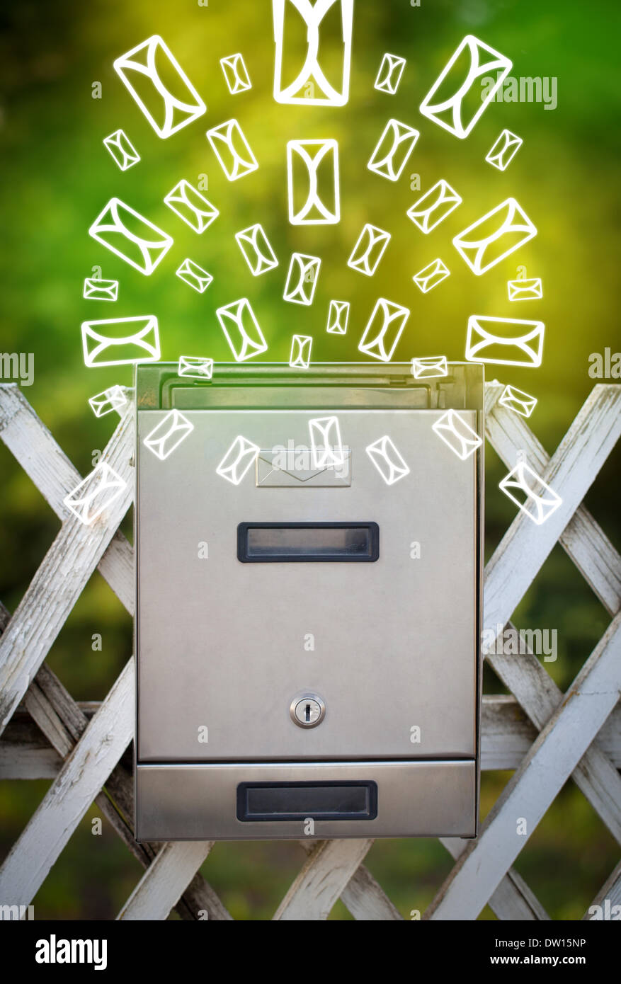 Mailbox with letter icons on glowing green background Stock Photo - Alamy