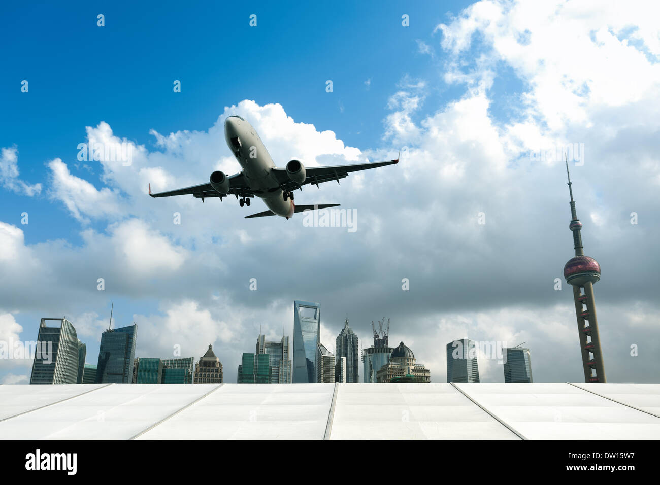 airplane with modern city Stock Photo - Alamy