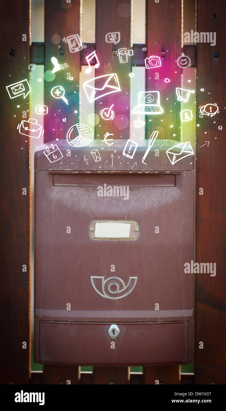 Colorful icons and symbols bursting out of a mailbox Stock Photo - Alamy