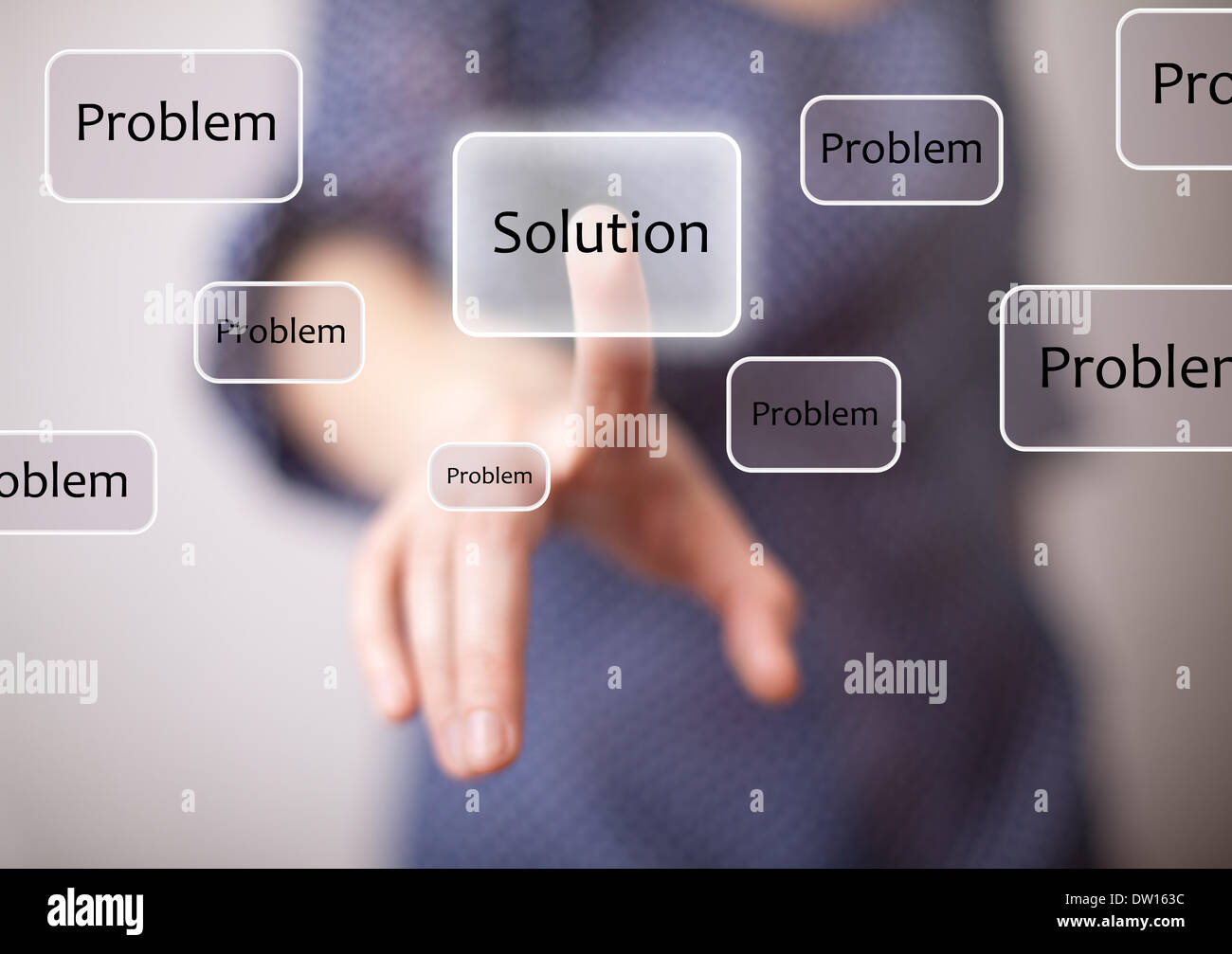 finger on solution button Stock Photo - Alamy
