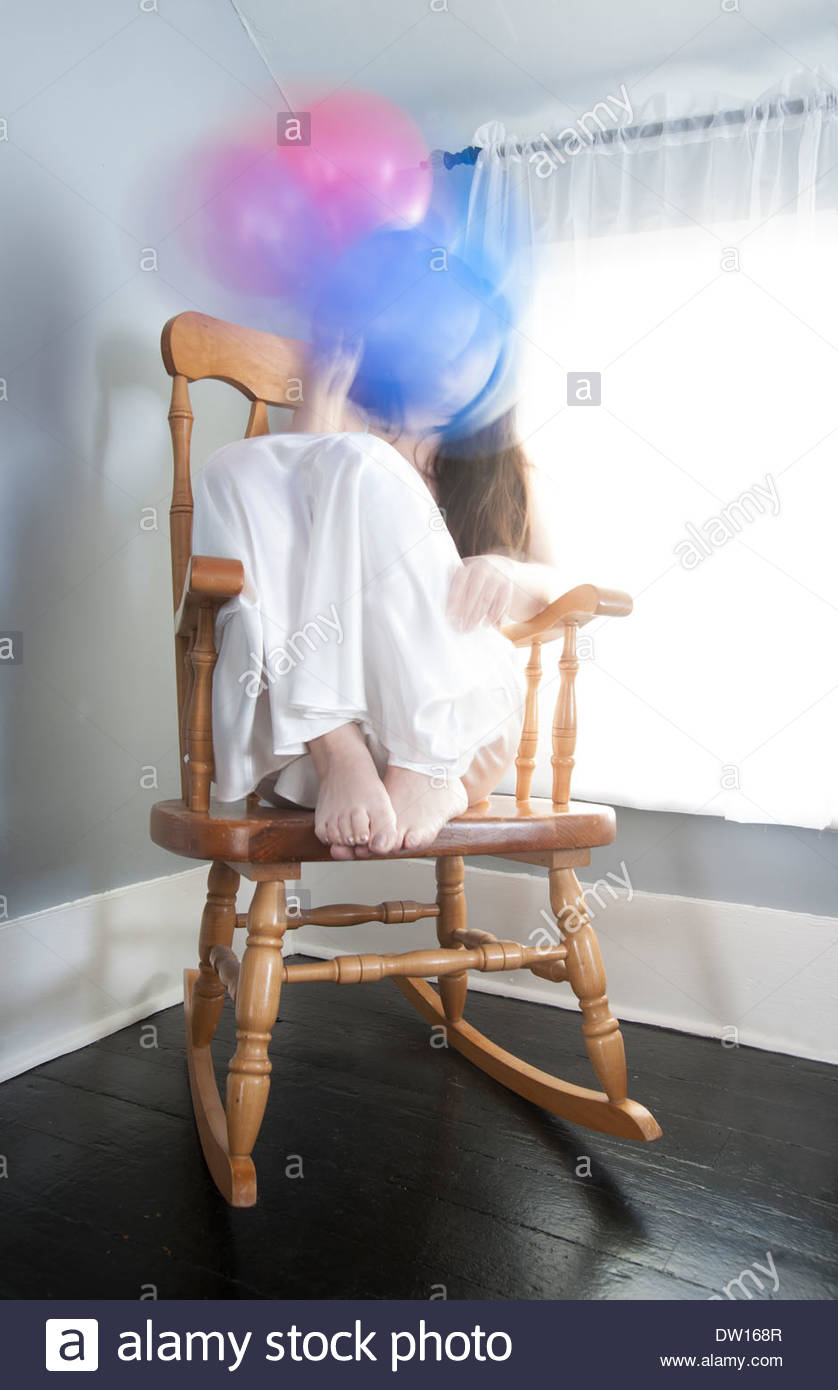Woman In A Rocking Chair Stock Photos & Woman In A Rocking Chair Stock ...