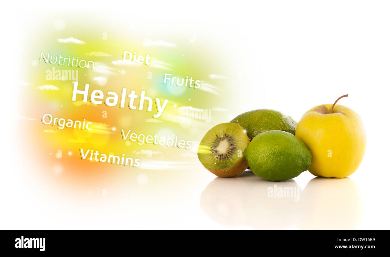 Colorful juicy fruits with healthy text and signs Stock Photo - Alamy