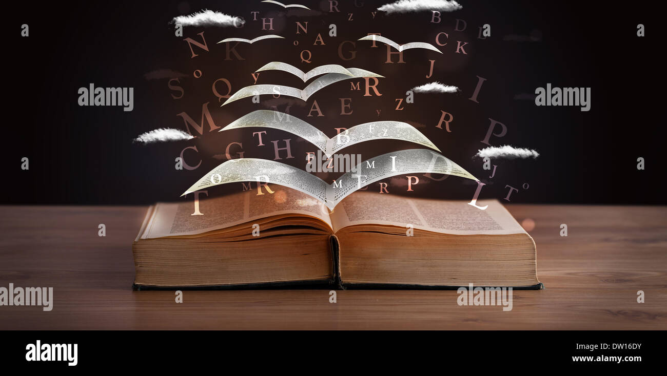 Open books glowing letters hi-res stock photography and images - Alamy