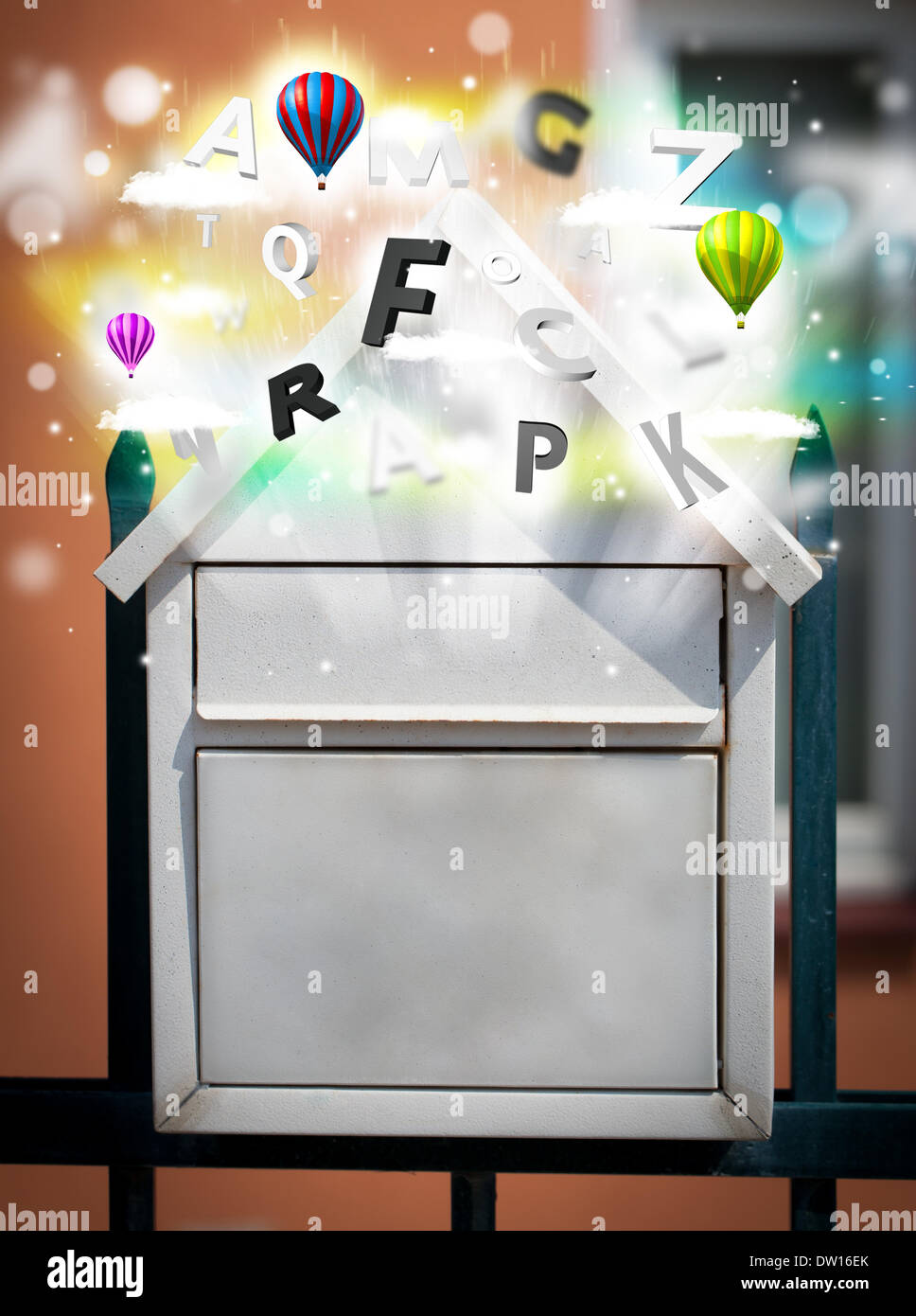 Post box with colorful letters Stock Photo - Alamy