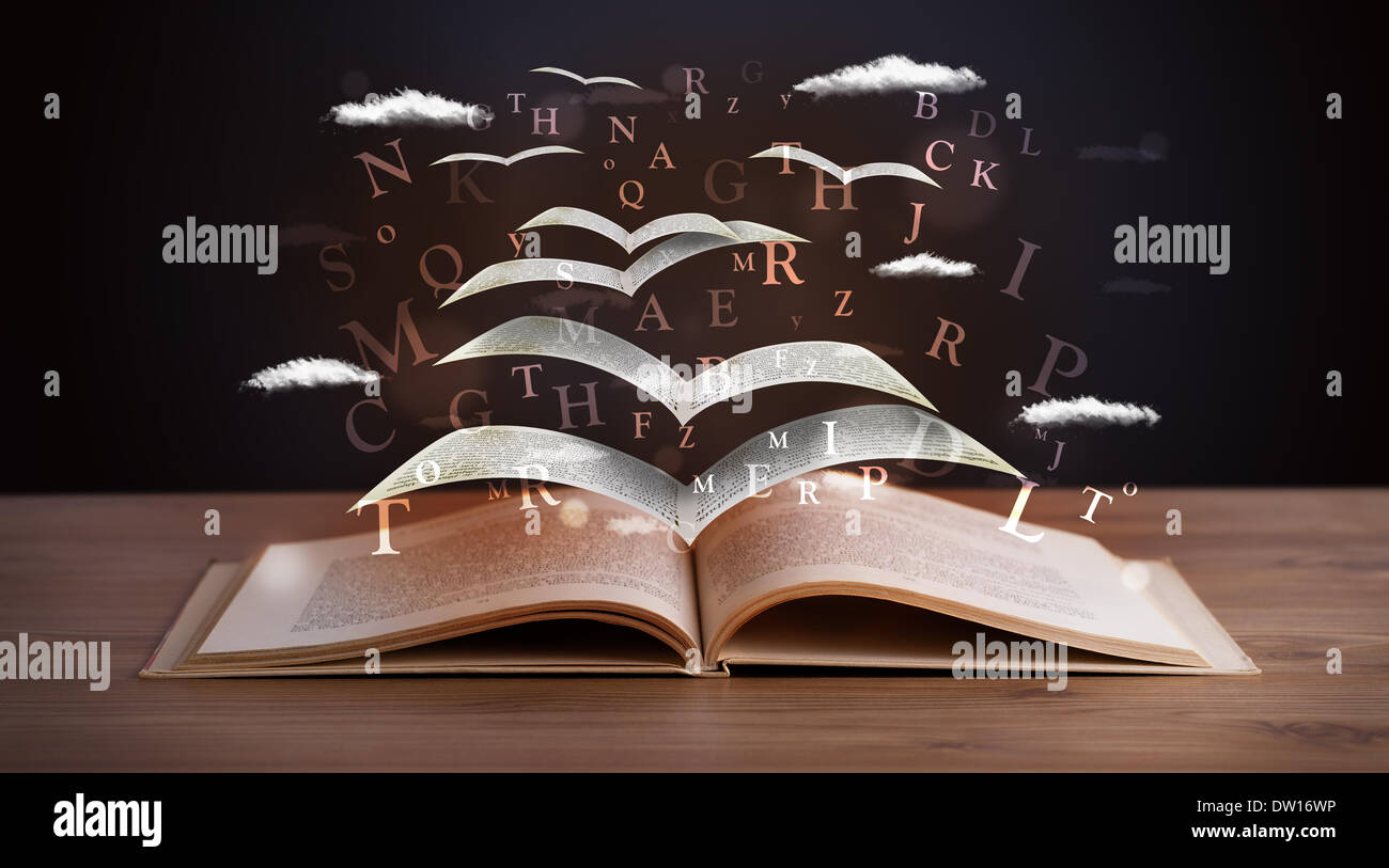Open books glowing letters hi-res stock photography and images - Alamy