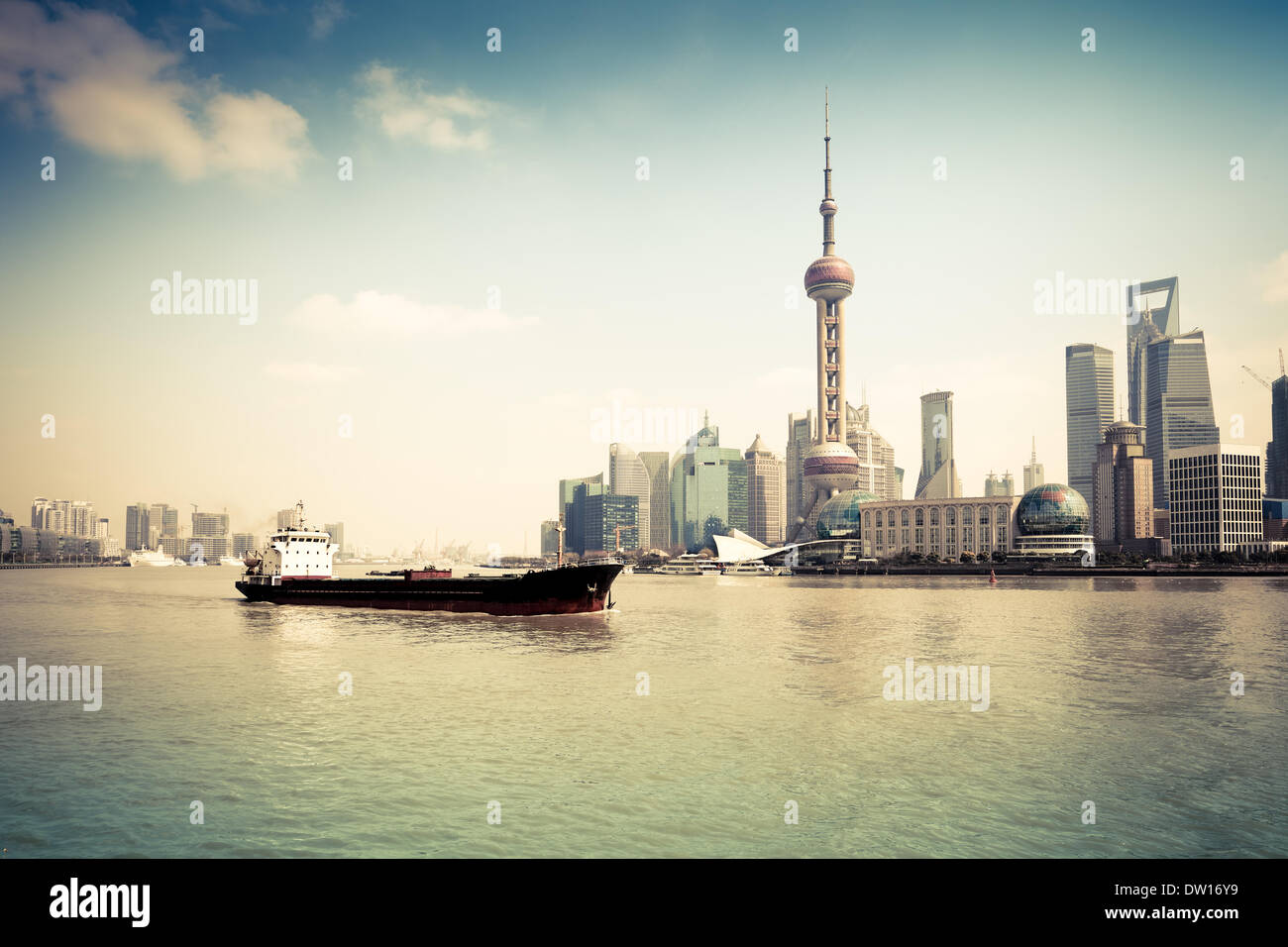 a cargo ship in the huangpu river Stock Photo - Alamy