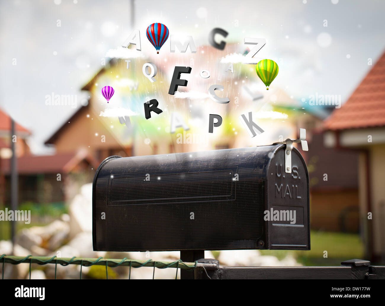 Post box with colorful letters Stock Photo - Alamy