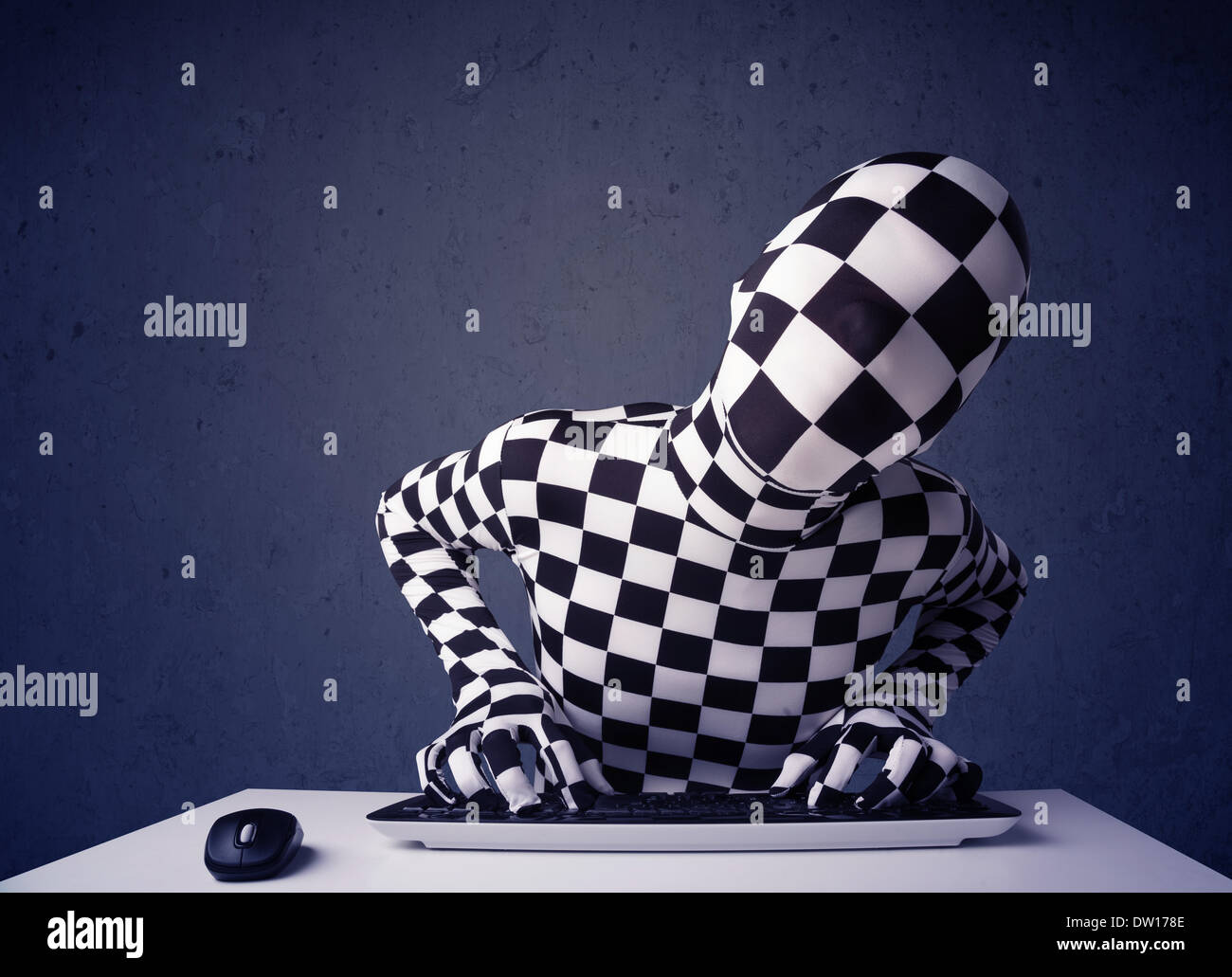 Man without identity working with keyboard on blue background Stock ...