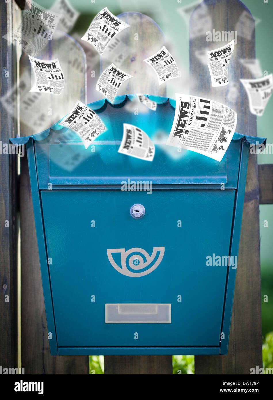 Post box with daily newspapers flying Stock Photo - Alamy