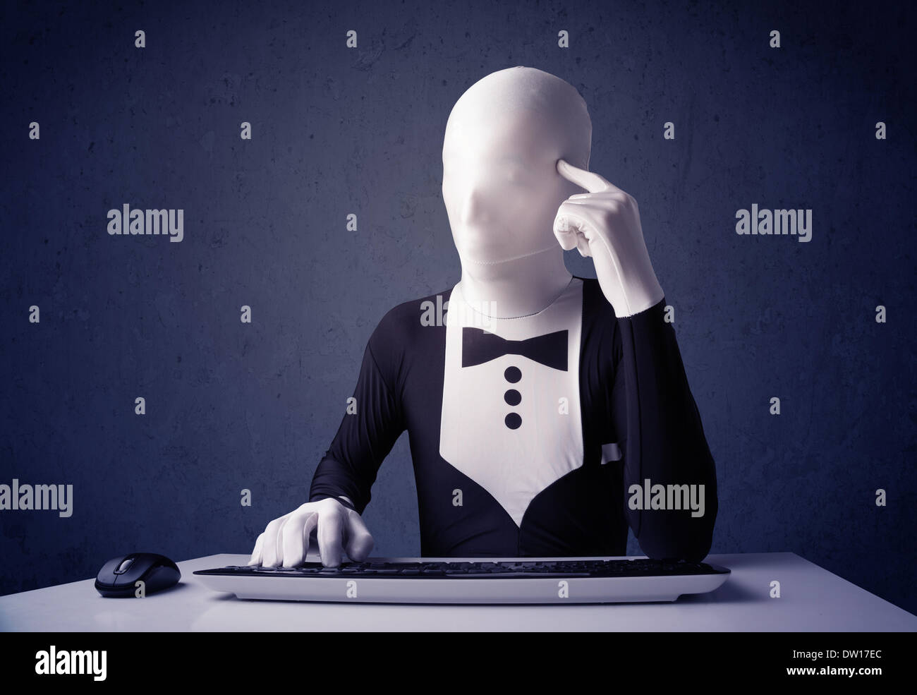 Man without identity working with keyboard on blue background Stock ...