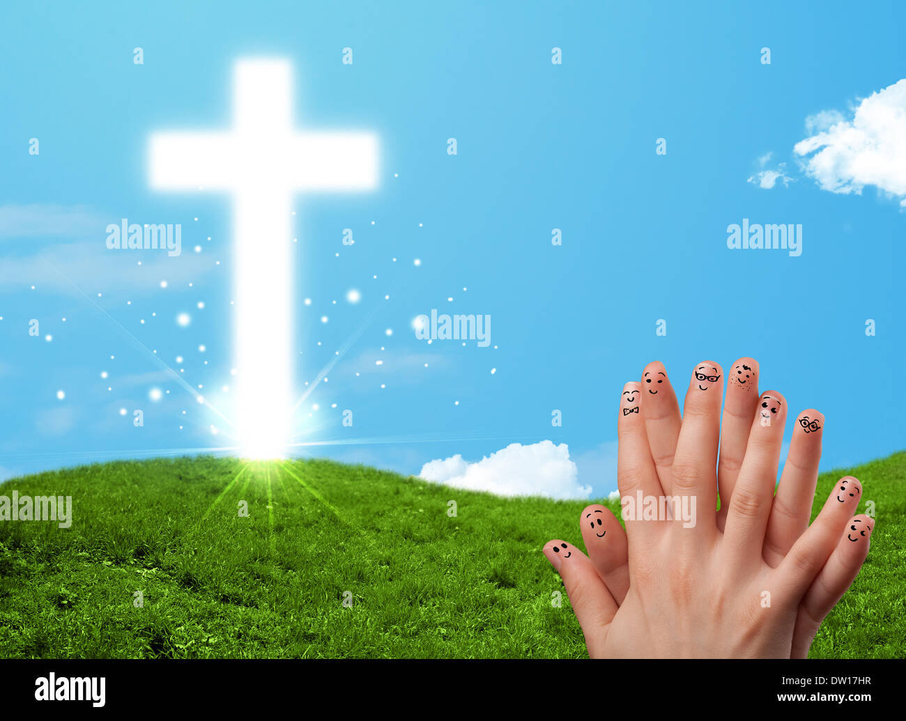 Happy finger smileys with christian religion cross Stock Photo - Alamy