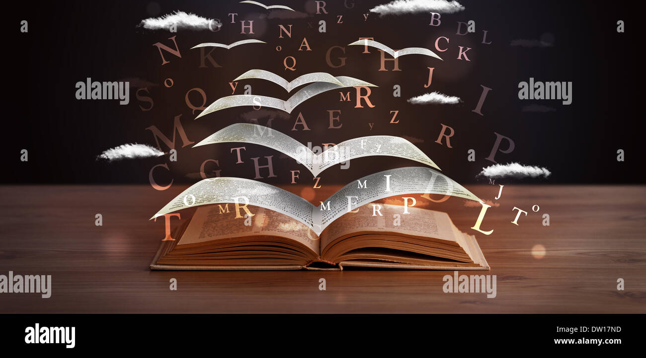 Pages and glowing letters flying out of a book Stock Photo - Alamy