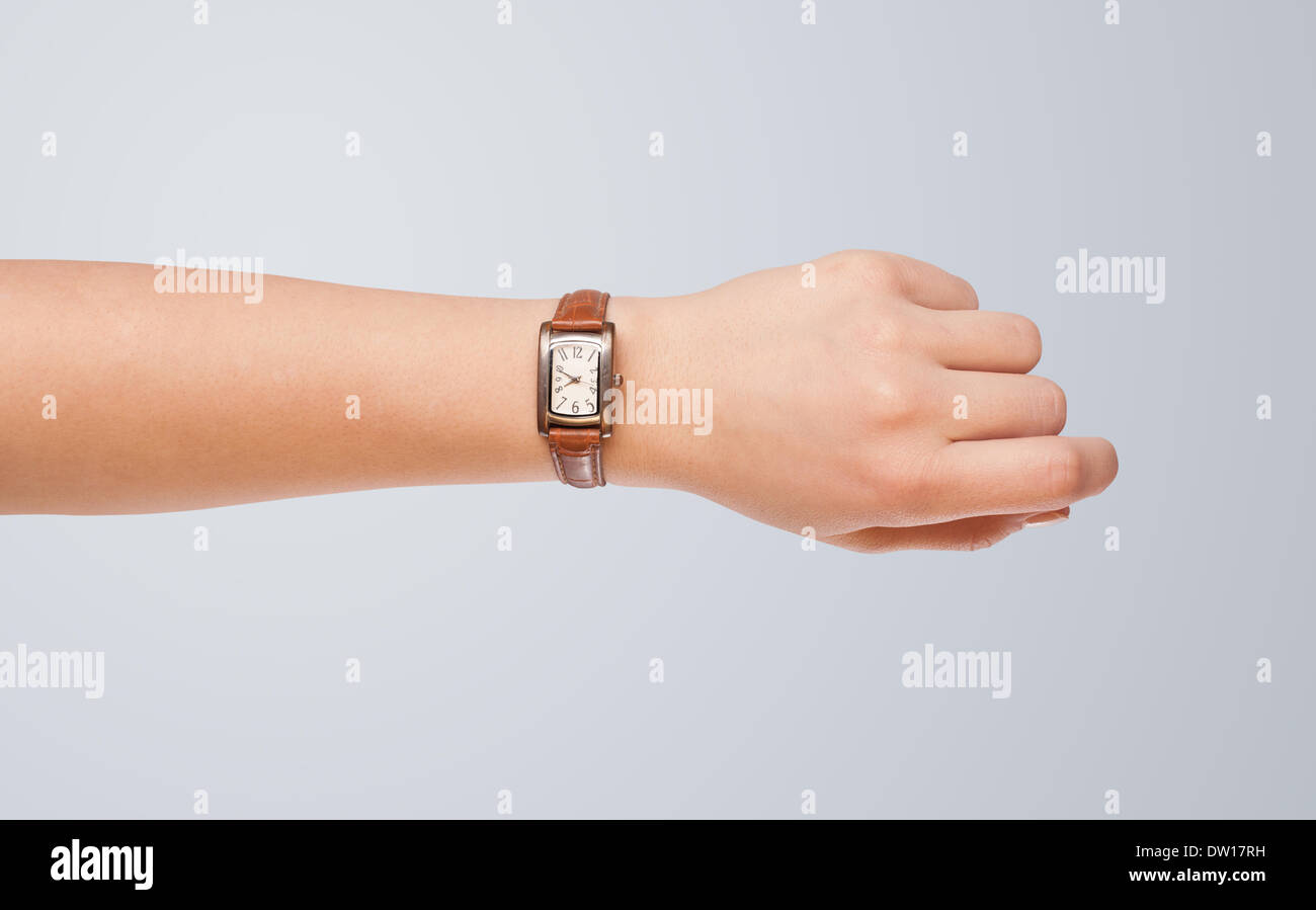 Hand with watch showing precise time Stock Photo - Alamy