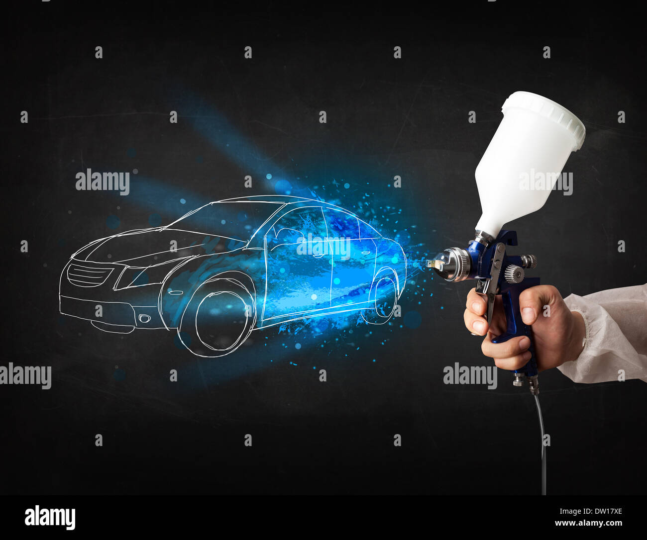 Worker with airbrush gun painting hand drawn car lines Stock Photo - Alamy