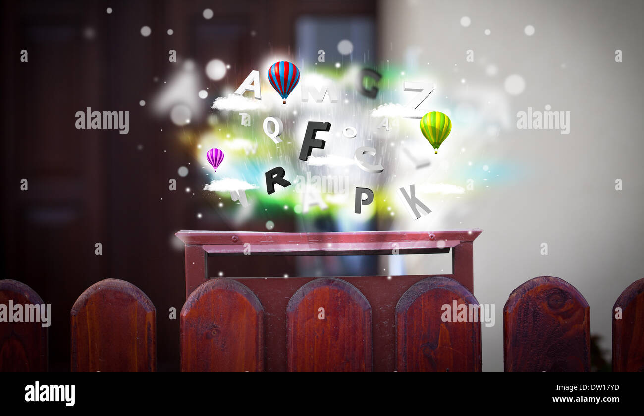 Post box with colorful letters Stock Photo - Alamy