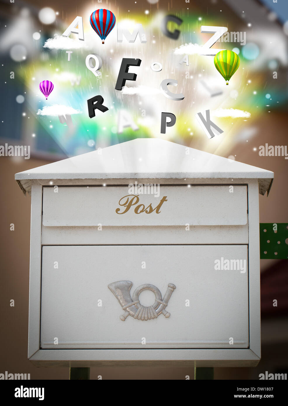 Post box with colorful letters Stock Photo - Alamy