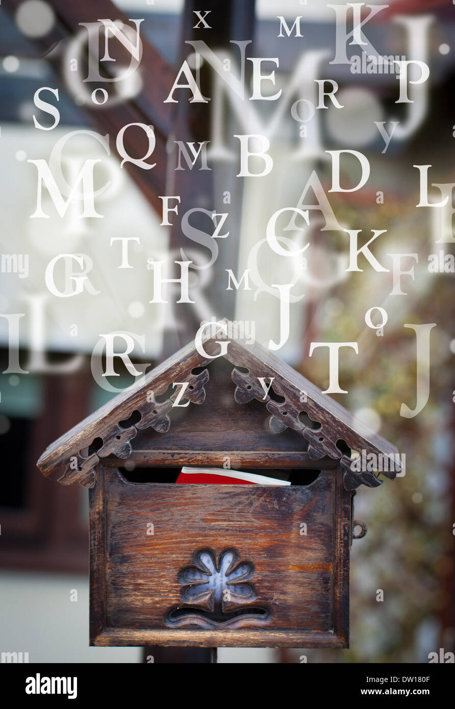 Mail box with letters comming out Stock Photo - Alamy